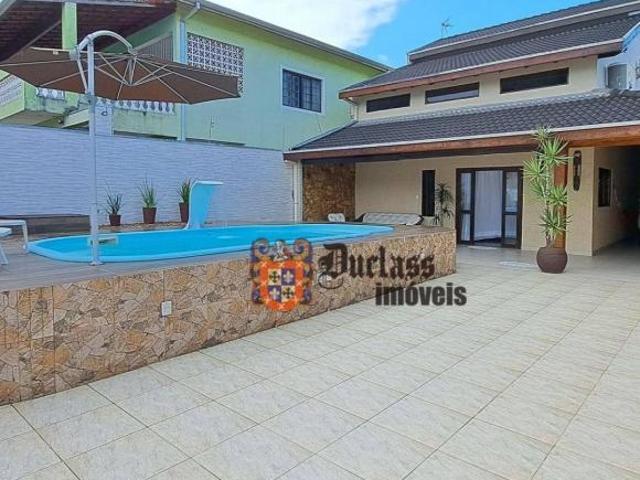 Sobrado com 4 dormitórios à venda, 246 m² por R$ 1.200.000,00 Jardim Aruan Caraguatatuba/SP