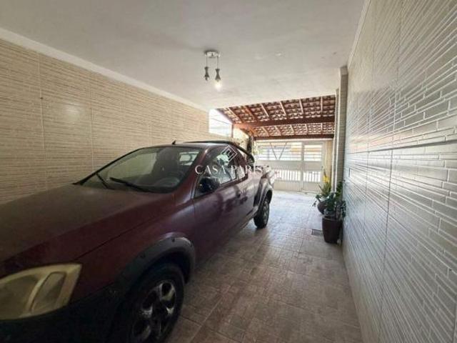 Sobrado com 4 dormitórios à venda, 260 m² por R$ 750.000 Tude Bastos Praia Grande/SP