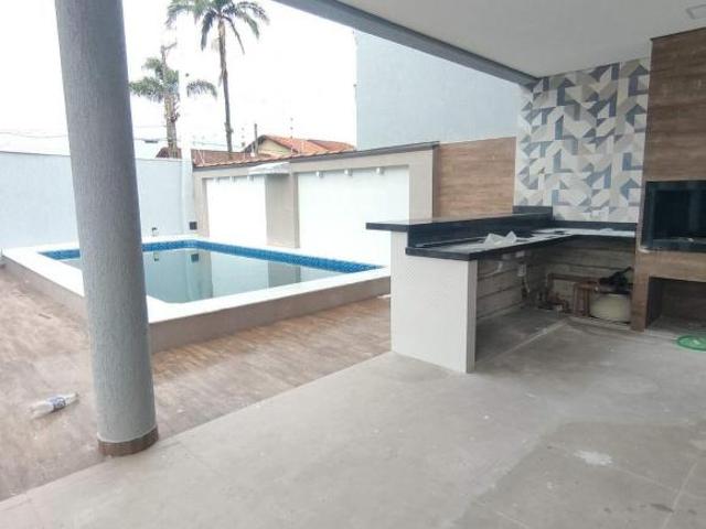 Sobrado com 4 dormitórios à venda, 295 m² por R$ 1.400.000,00 Balneário Flórida Praia Grande/SP
