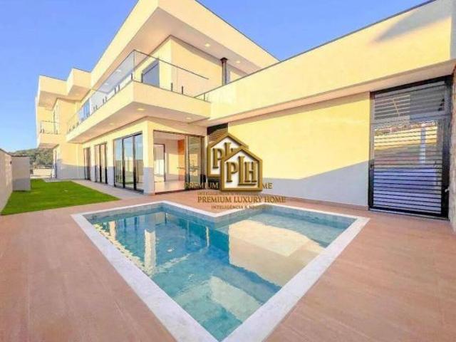 Sobrado com 4 dormitórios à venda, 295 m² por R$ 2.960.000,00 Condomínio Reserva São Nicolau Ati