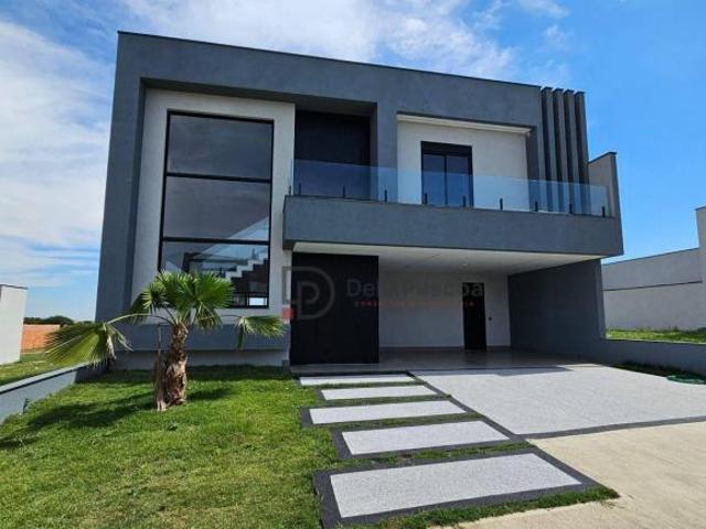 Sobrado com 4 dormitórios à venda, 296 m² por R$ 2.950.000,00 Condomínio Dona Maria Cândida Inda