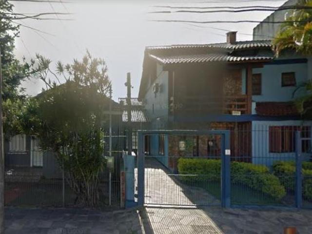 Sobrado com 4 dormitórios à venda, 292 m² por R$ 1.2000 Sarandi