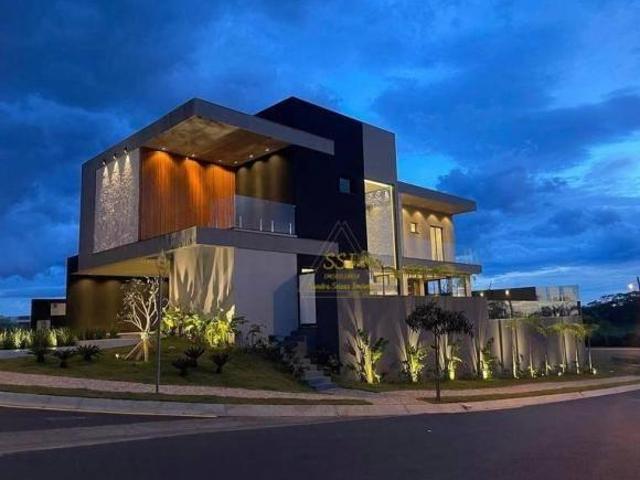 Sobrado com 4 dormitórios à venda, 331 m² por R$ 3.200.000,00 Parque Universitário Condomínio Vill