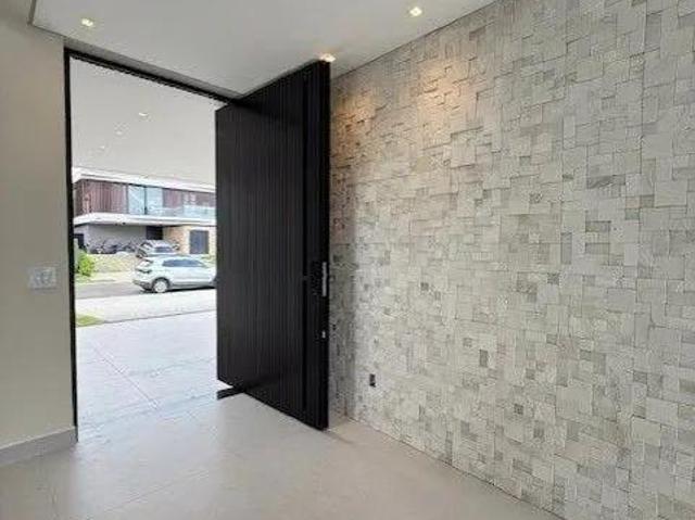 Sobrado com 4 dormitórios à venda, 332 m² por R$ 3.400.000,00 Condomínio Alpha
