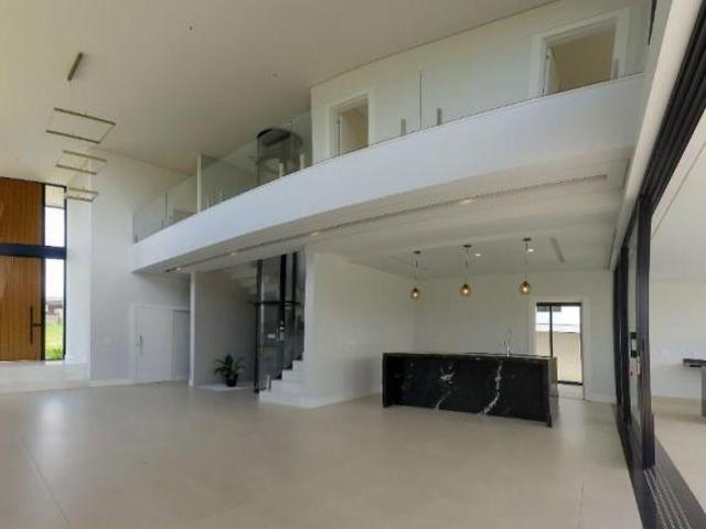 Sobrado com 4 dormitórios à venda, 357 m² por R$ 3.750.000,00 Alphaville Nova Esplanada Votorant
