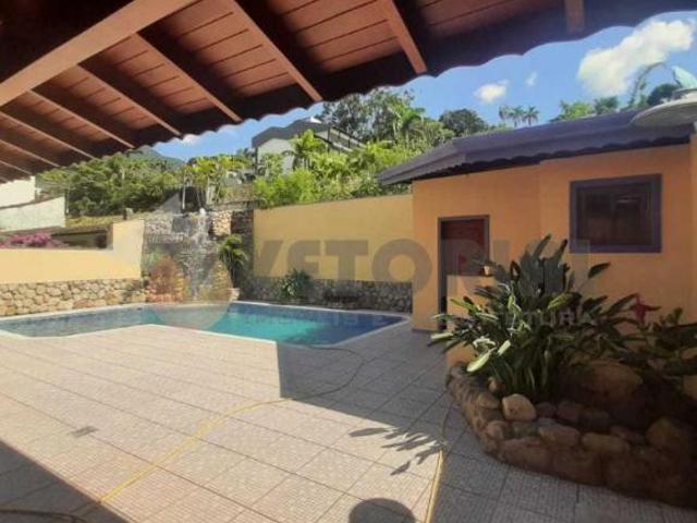 Sobrado com 4 dormitórios à venda, 370 m² por R$ 2.000.000,00 Pr Arrastão São Sebastião/SP