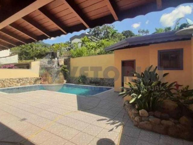 Sobrado com 4 dormitórios à venda, 370 m² por R$ 2.300.000,00 Praia Arrastão