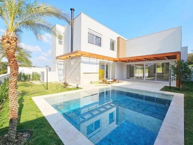 Sobrado com 4 dormitórios à venda, 420 m² por R$ 6.885.000,00 Condomínio Parque da Figueira/Helvet