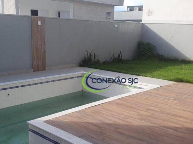 Sobrado com 4 dormitórios à venda, 450 m² por R$ 2.950.000,00 Condomínio Residencial Jaguary São