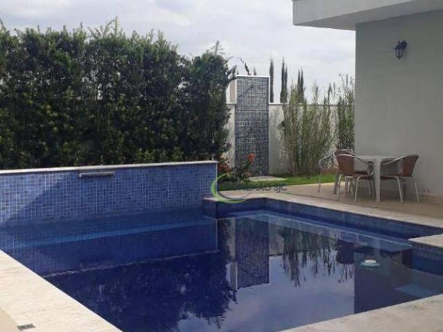 Sobrado com 4 dormitórios à venda, 700 m² por R$ 5.500.000,00 Condomínio Reserva do Paratehy São