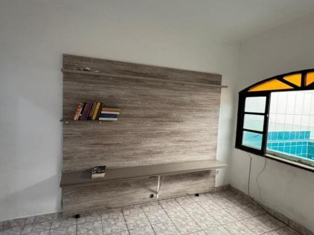 Sobrado com 4 dormitórios à venda, 90 m² por R$ 495.000,00 Aviação Praia Grande/SP