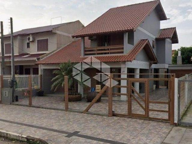 Sobrado com 4 dormitórios/quartos sendo 1 suíte, mobiliado no bairro Zona Nova em Capão da Canoa