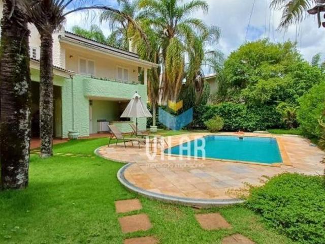 Sobrado com 4 quartos, 420 m² venda por R$ 2.950.000 ou aluguel por R$ 14.800/mês Condomínio Lag
