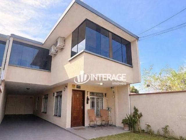 Sobrado com 4 quartos à venda, 206 m² por R$ 1.300.000 Novo Mundo Curitiba/PR