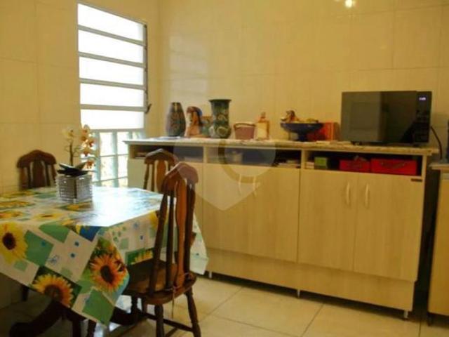 Sobrado com 4 quartos à venda em Taboão SP