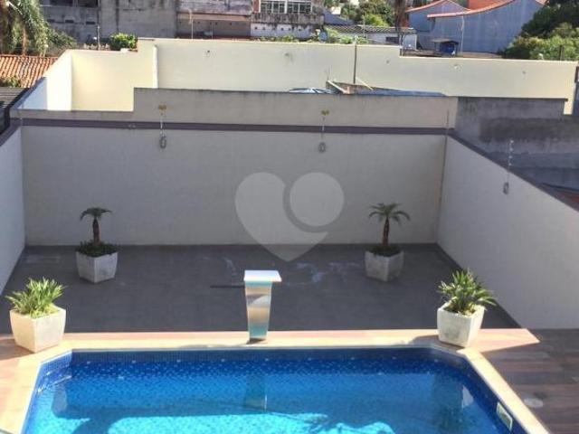 Sobrado com 4 quartos à venda em Vila Galvão SP
