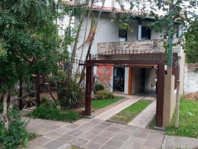 Sobrado com 5 dormitórios à venda, 370 m² por R$ 1.800.000,00 Dom Feliciano Gravataí/RS