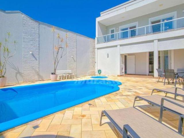Sobrado com 5 dormitórios à venda, 408 m² por R$ 2.250.000,00 Cohapar Guaratuba/PR