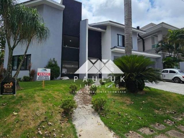 Sobrado com 5 dormitórios, sendo 4 suítes à venda, 604 m² por R$ 3.500.000 Condomínio Residencial