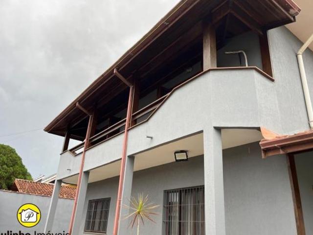 Sobrado com 5 Dorms, sendo 4 Suítes em Peruíbe, 311m² com piscina a 1,5 km do Centro
