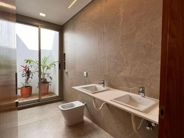 Sobrado com 5 quartos à venda, Condomínio Jardins Gênova Uberlândia/MG