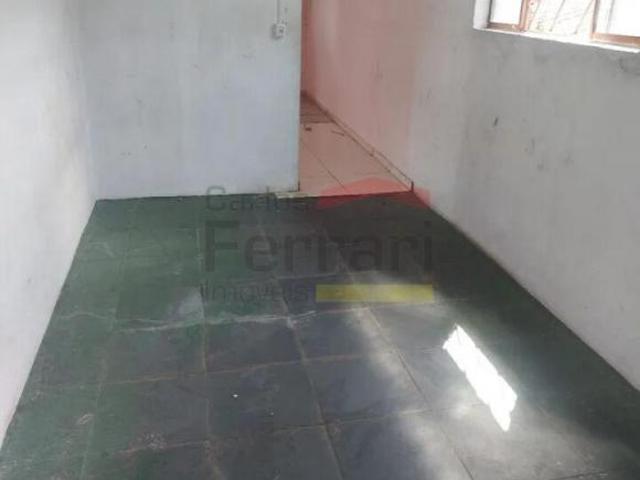 Sobrado com 7 casas para renda no Jd. Peri