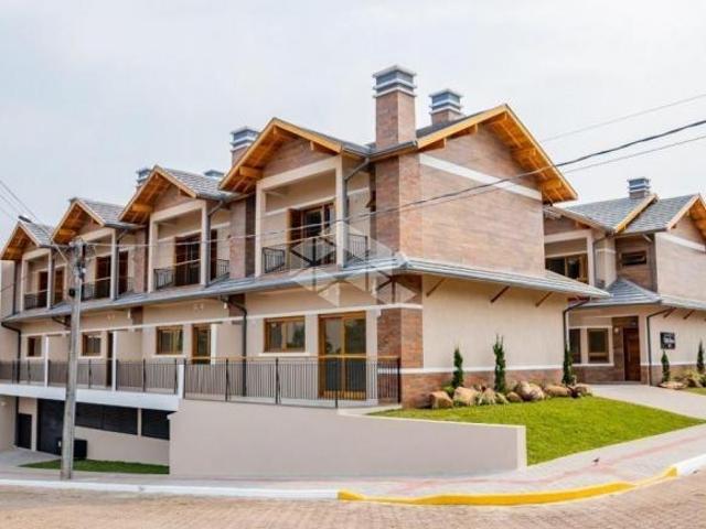 Sobrado com 02 suítes e vaga coberta