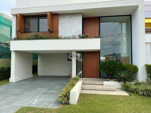 Sobrado com 04 dormitórios, 357 M² área privativa, mobiliado e decorado no condomínio fechado Capão