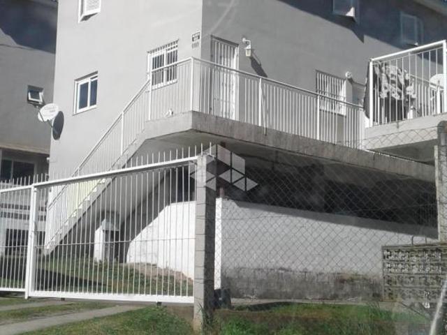 Sobrado com 2 dormitório, sala e banheiro, cozinha com churrasqueira e garagem no bairro desvio ri