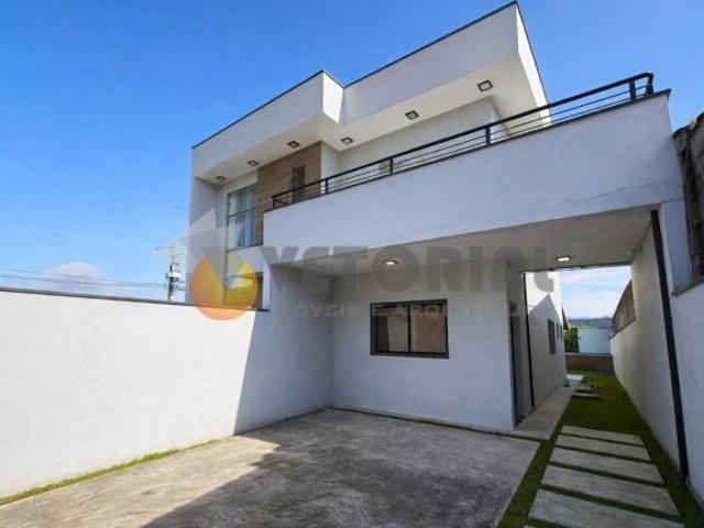 Sobrado com 2 dormitórios à venda, 114 m² por R$ 580.000,00 Balneário dos Golfinhos Caraguatatub