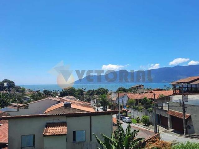 Sobrado com 2 dormitórios à venda, 120 m² por R$ 800.000 S F Praia São Sebastião/SP