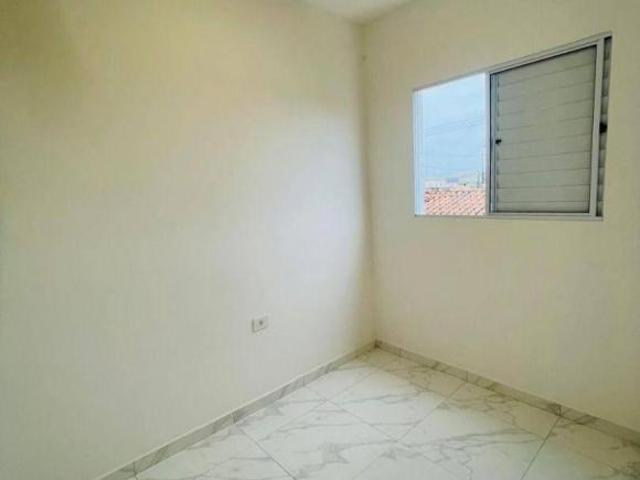 Sobrado com 2 dormitórios à venda, 50 m² por R$ 325.000 Vila Tupi Praia Grande/SP