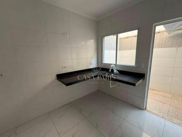 Sobrado com 2 dormitórios à venda, 57 m² por R$ 365.000,00 Tude Bastos Praia Grande/SP