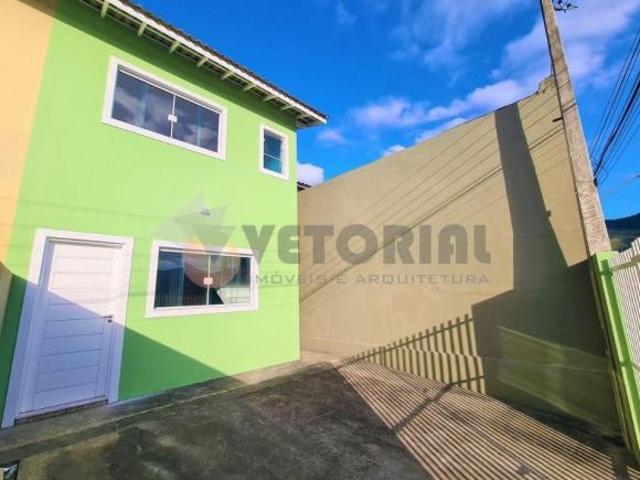 Sobrado com 2 dormitórios à venda, 68 m² por R$ 385.000,00 C Mar São Sebastião/SP