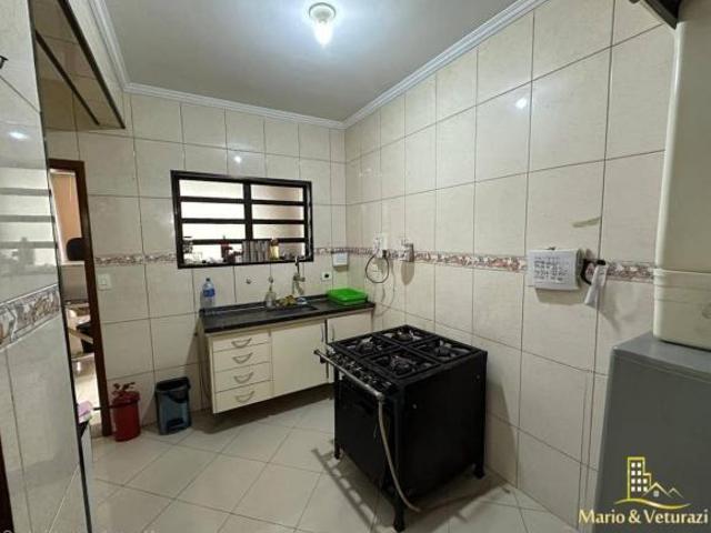 Sobrado com 2 dormitórios à venda, 71 m² por R$ 390.000,00 Vila Santa Rosa Guarujá/SP