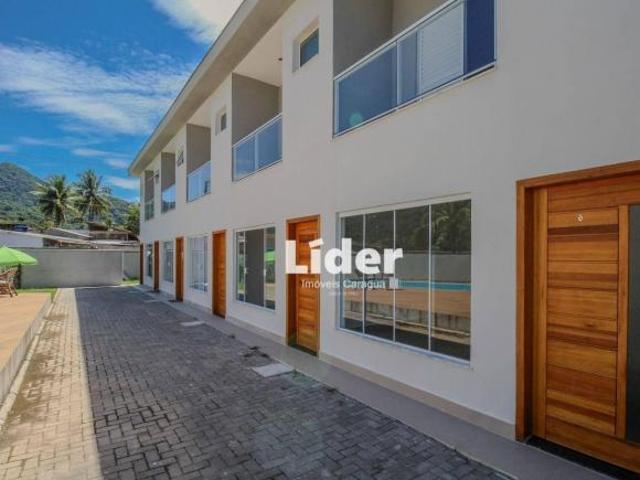 Sobrado com 2 dormitórios à venda, 72 m² por R$ 530.000,00 Massaguaçu Caraguatatuba/SP
