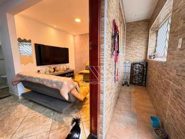 Sobrado com 2 dormitórios à venda, 80 m² por R$ 479.000 Estuário Santos/SP