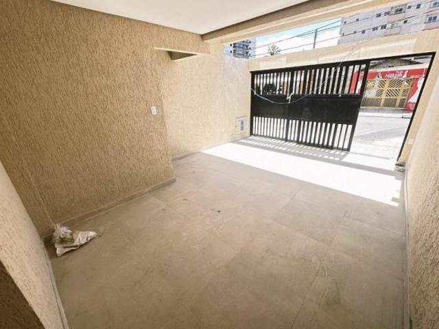 Sobrado com 2 dormitórios à venda, 82 m² por R$ 570.000,00 Tupi Praia Grande/SP