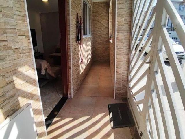 Sobrado com 2 dormitórios à venda, 85 m² por R$ 480.000,00 Estuário Santos/SP