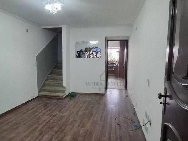Sobrado com 2 dormitórios, quintal com churrasqueira, vaga coberta e excelente localização no Jardim