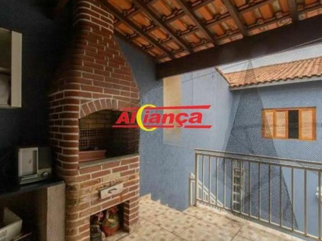 SOBRADO COM 2 DORMITÓRIOS, 1 SUÍTE E 2 VAGAS, com edícula. TEREZÓPOLIS
