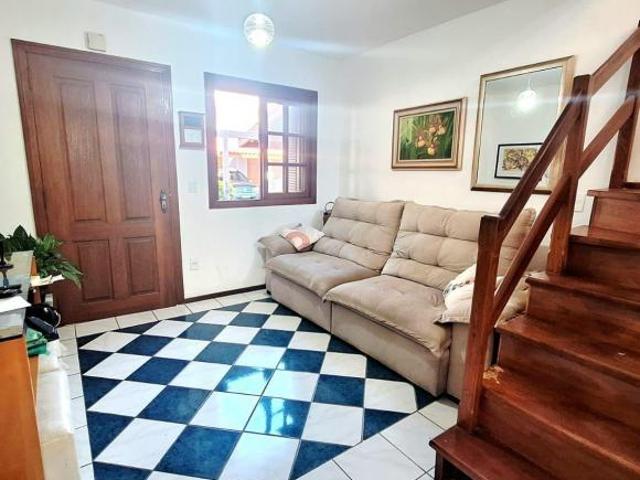 Sobrado com 2 dormitórios, 1 vaga, na Av. Otto Niemeyer, bairro Camaquã, Poa, RS