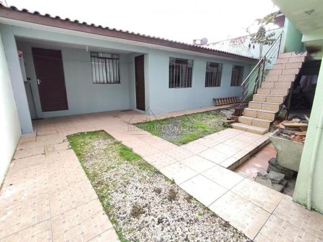 Sobrado com 2 salas comerciais e casa independente