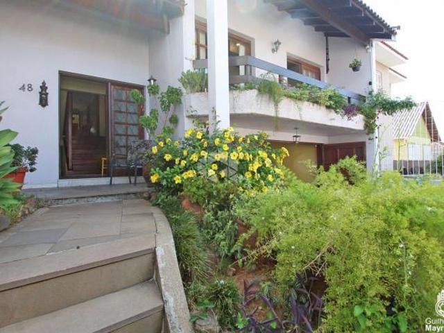 Sobrado com 326m2 no Partenon com 3 quartos no bairro