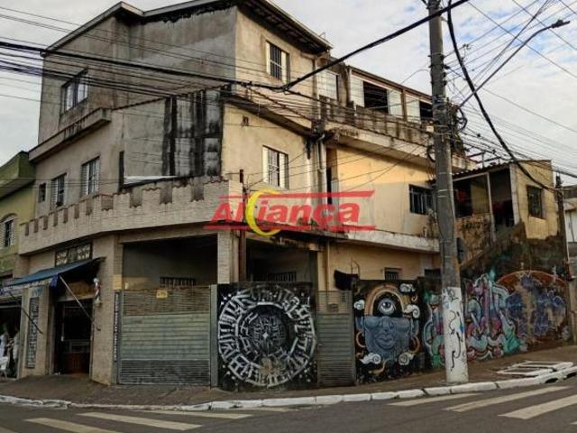 SOBRADO COM 3 CASAS E UM SALÃO COMERCIAL VL. FLORIDA GUARULHOS SP