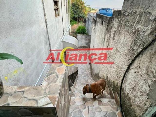 Sobrado com 3 casas para renda Bairro Pimentas contendo 245m²