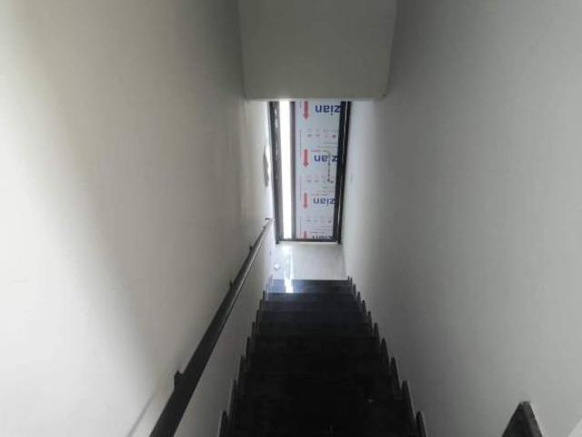 Sobrado com 3 dormitórios à venda, 104 m² por R$ 609.000 Vila Guilhermina Praia Grande/SP