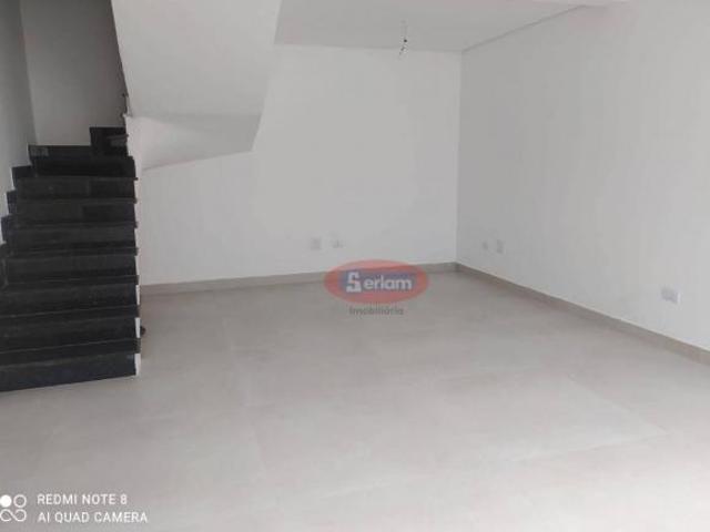 Sobrado com 3 dormitórios à venda, 107 m² por R$ 825.000,00 Estuário Santos/SP