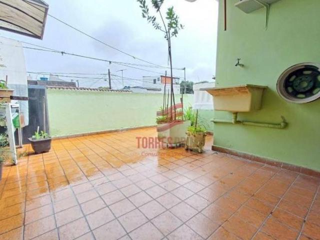 Sobrado com 3 dormitórios à venda, 117 m² por R$ 470.000,00 Estuário Santos/SP