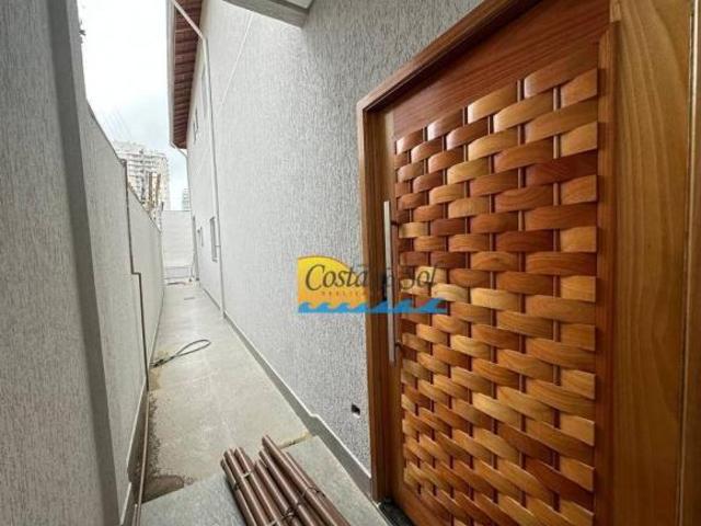 Sobrado com 3 dormitórios à venda, 125 m² por R$ 720.000,00 Ocian Praia Grande/SP